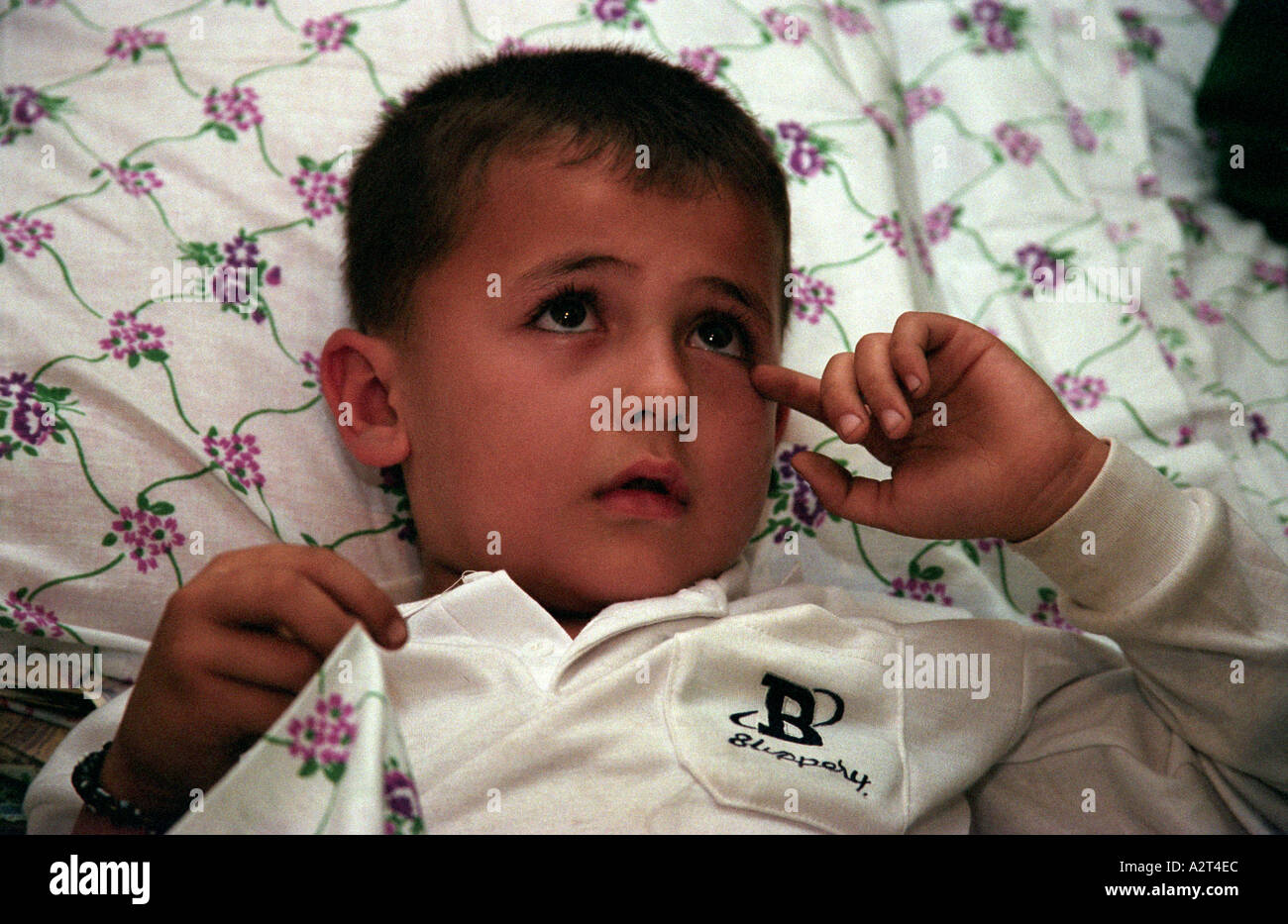 The boy bravely endured the pain Stock Photo - Alamy