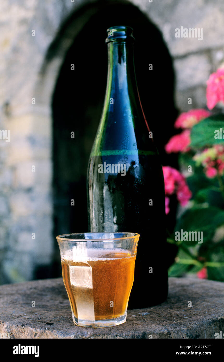 France, Calvados, glass and bottle of cider Stock Photo - Alamy