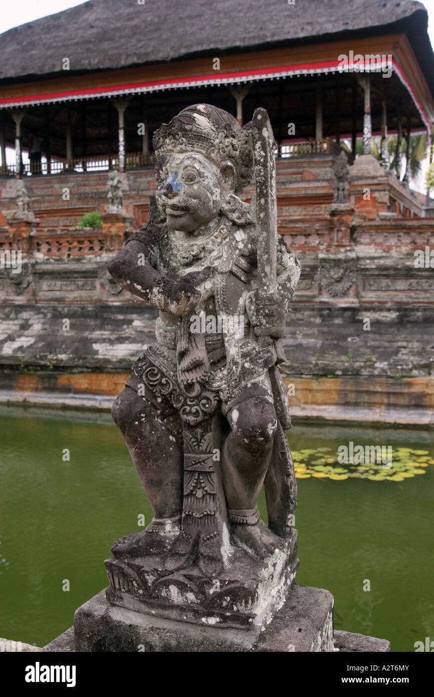 stone carved statue with the floating palace in background, in ...