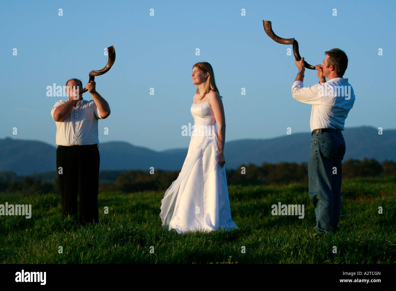 two man men shofar players blowing over girl woman female bride in ...