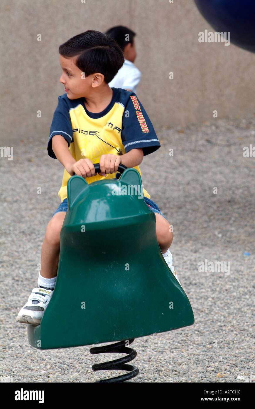 Young boy playing on a playground in Guayaquil, Ecuador Stock Photo - Alamy