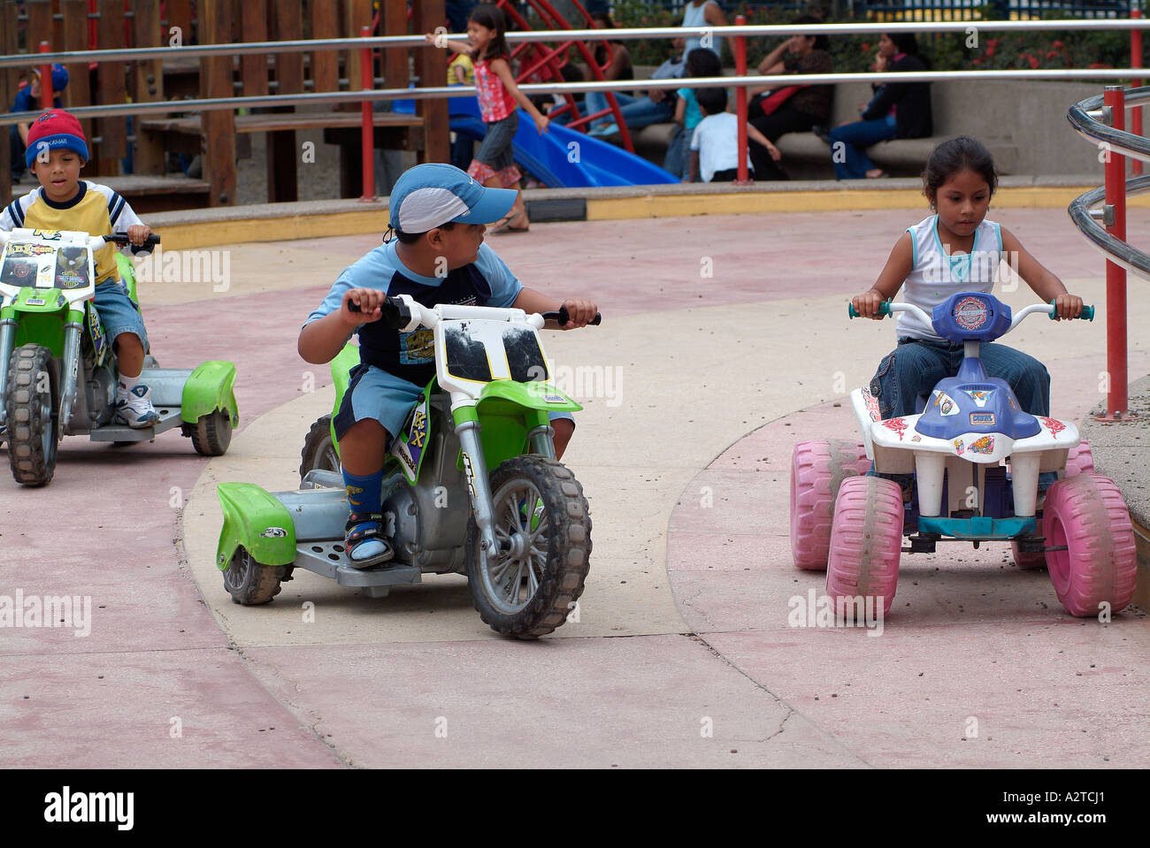 Kids on bikes playground hi-res stock photography and images - Alamy