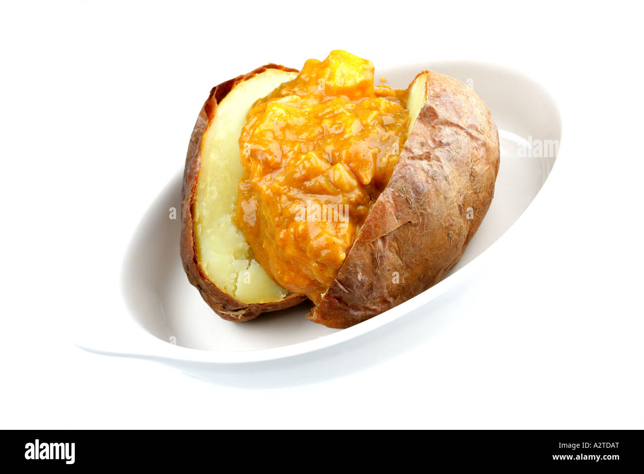 Jaccket Potato with Chicken Curry Stock Photo - Alamy