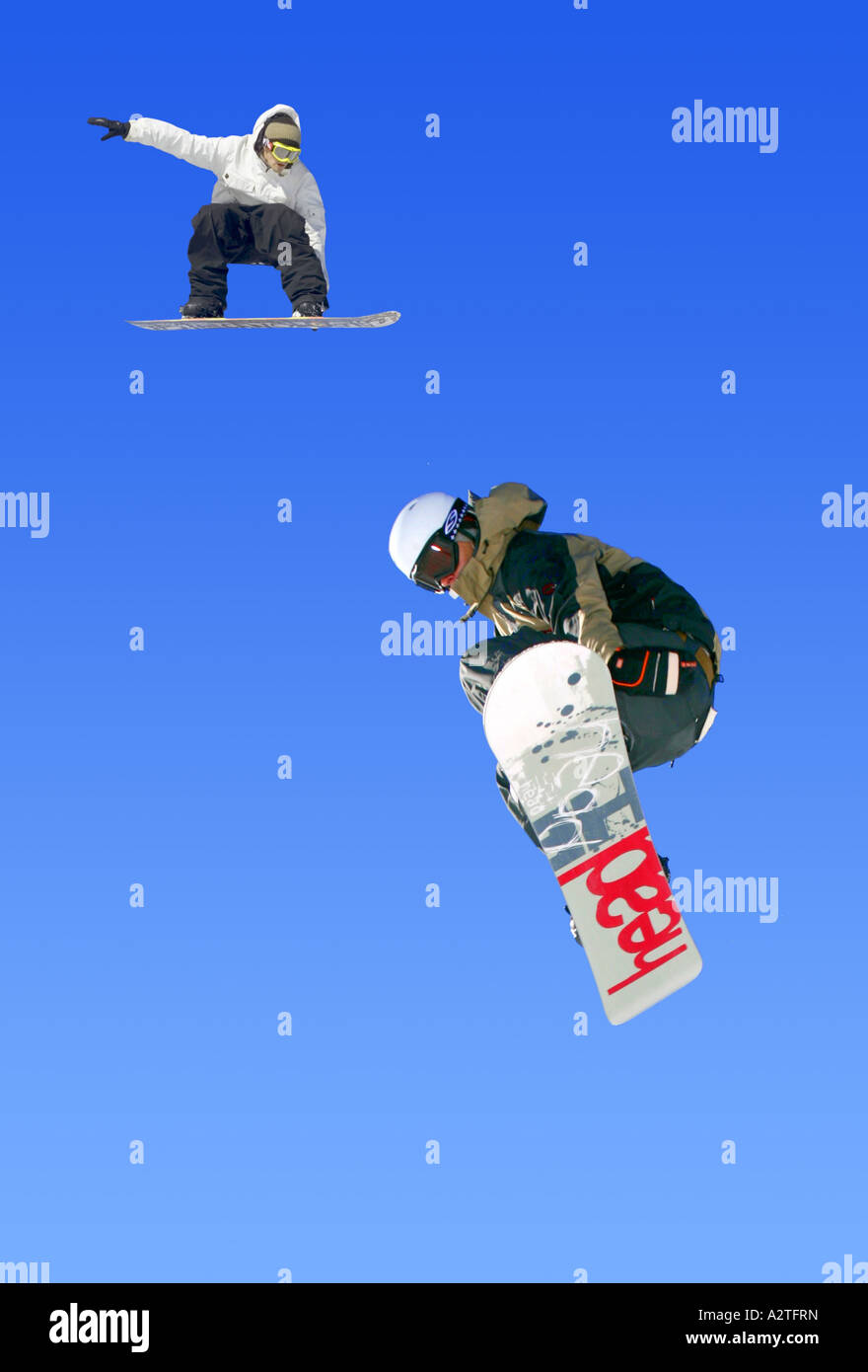 two flying snowboarder, Austria, Alps Stock Photo - Alamy
