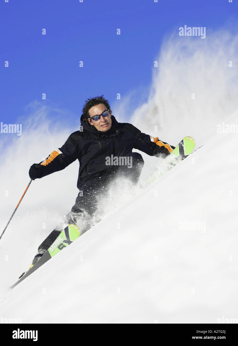 Skier racing down a slope hi-res stock photography and images - Alamy