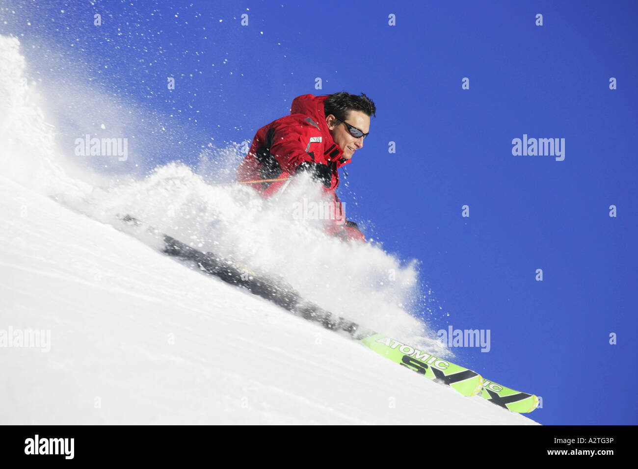 Skier racing down a slope hi-res stock photography and images - Alamy
