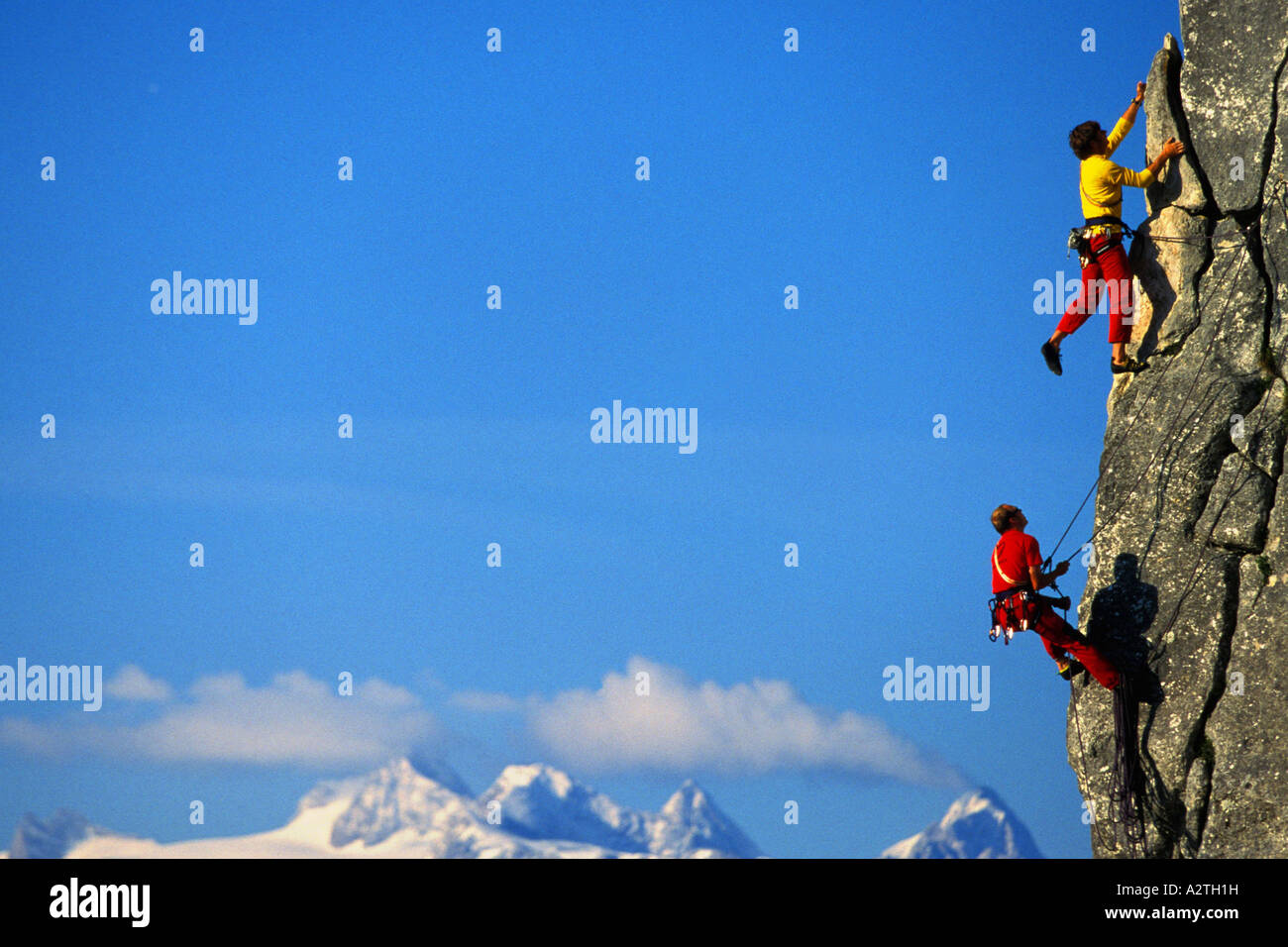 climbing on a rock Stock Photo - Alamy