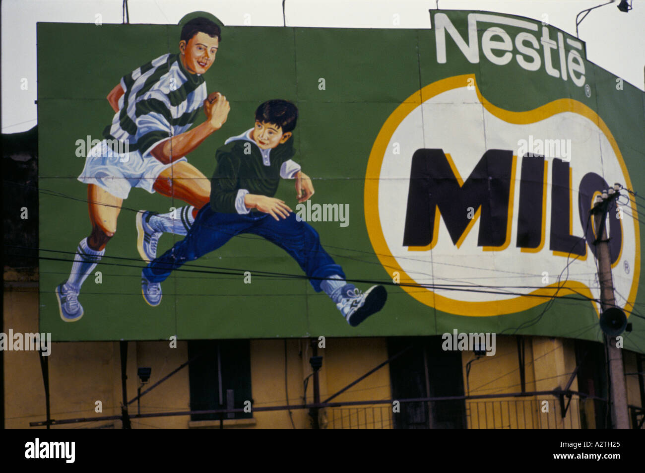milo advertisement mounted on a building in hanoi 1994 Stock Photo - Alamy