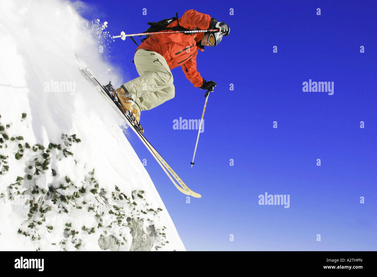 skier jumping downhill, Austria, Alps Stock Photo - Alamy