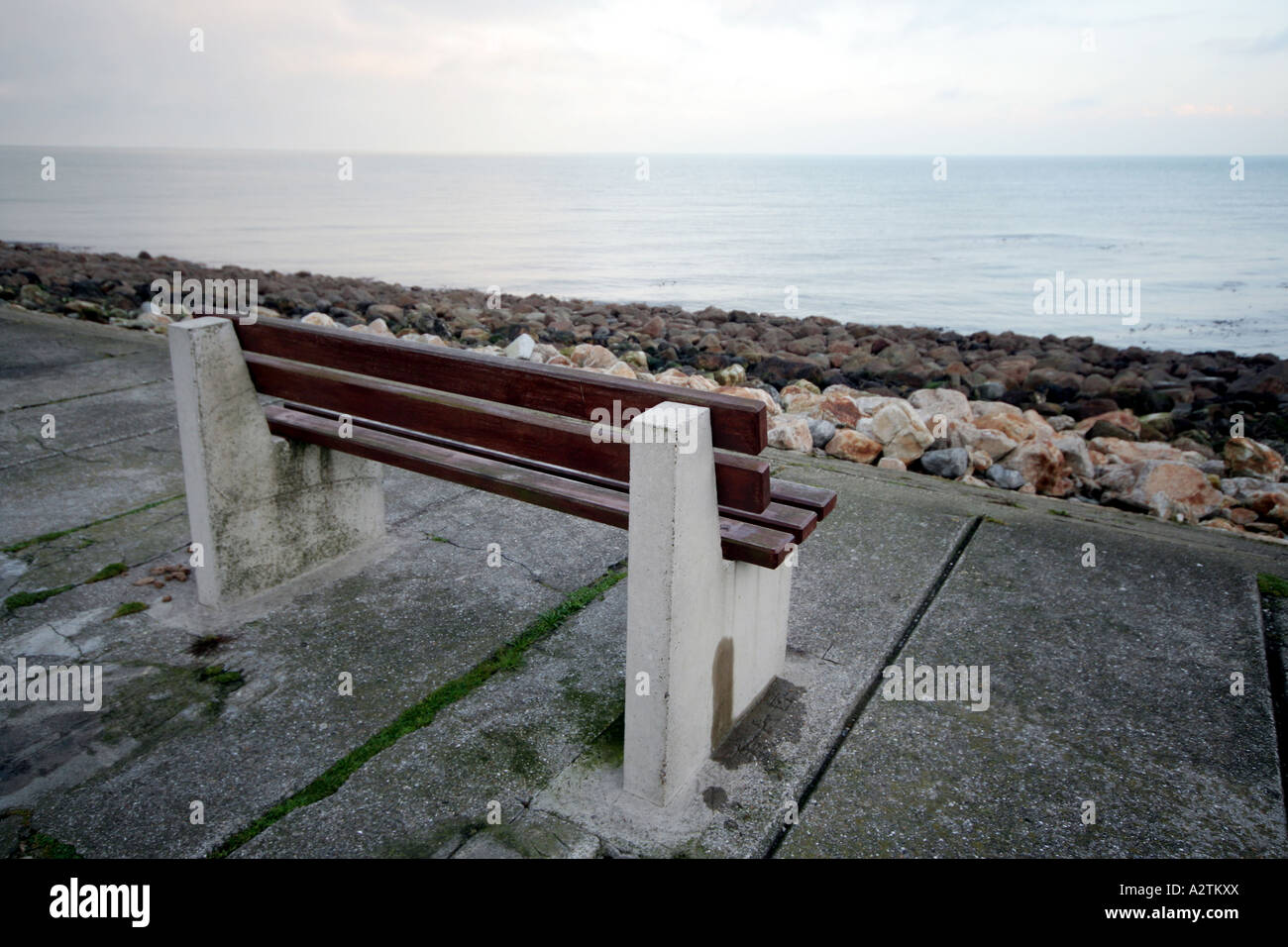 Bench at Coast Stock Photo - Alamy