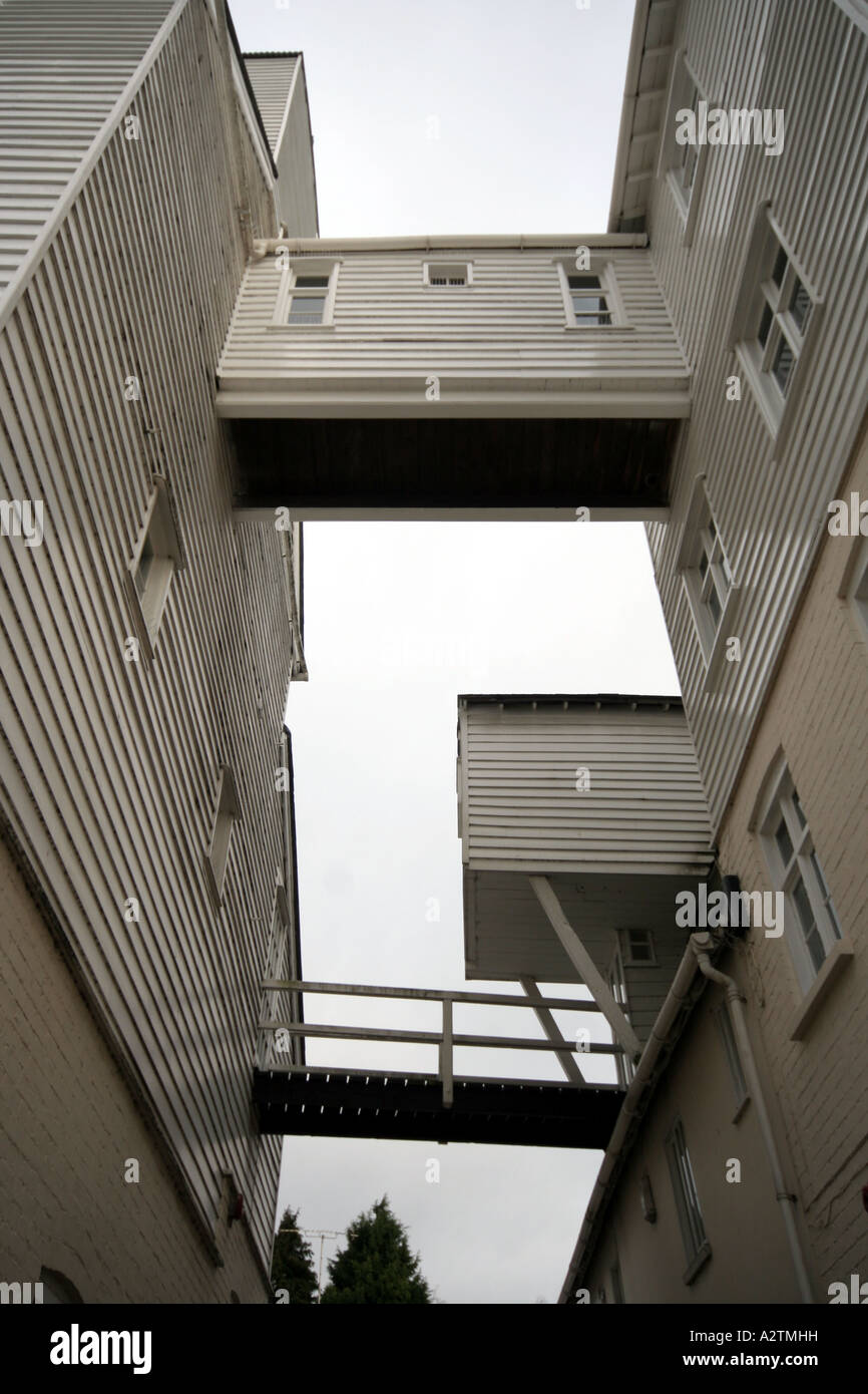 Architecutural design: white bridge across buildings Stock Photo - Alamy