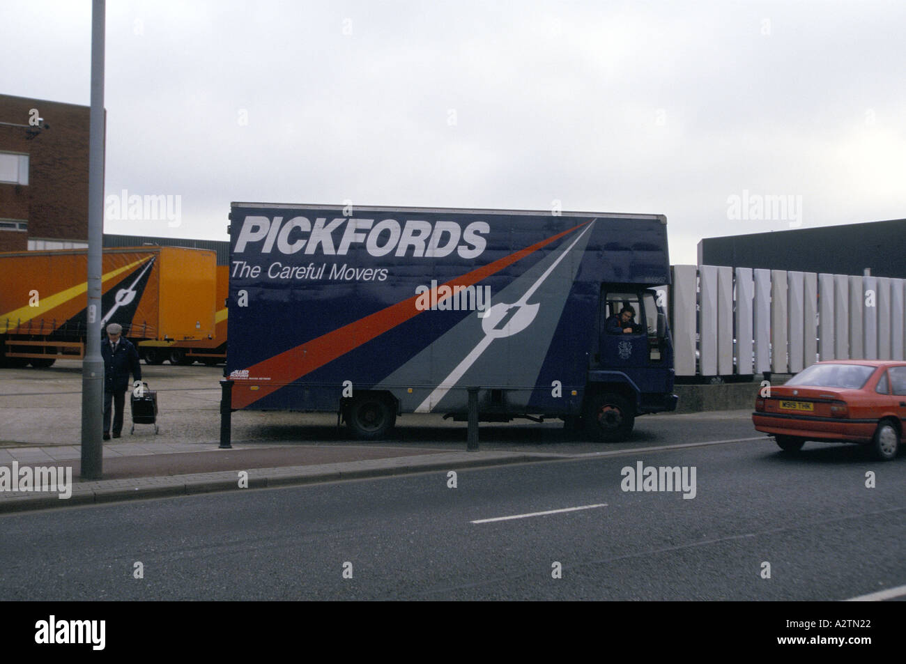 pickfords removal van entering main road old man behind van walking ...