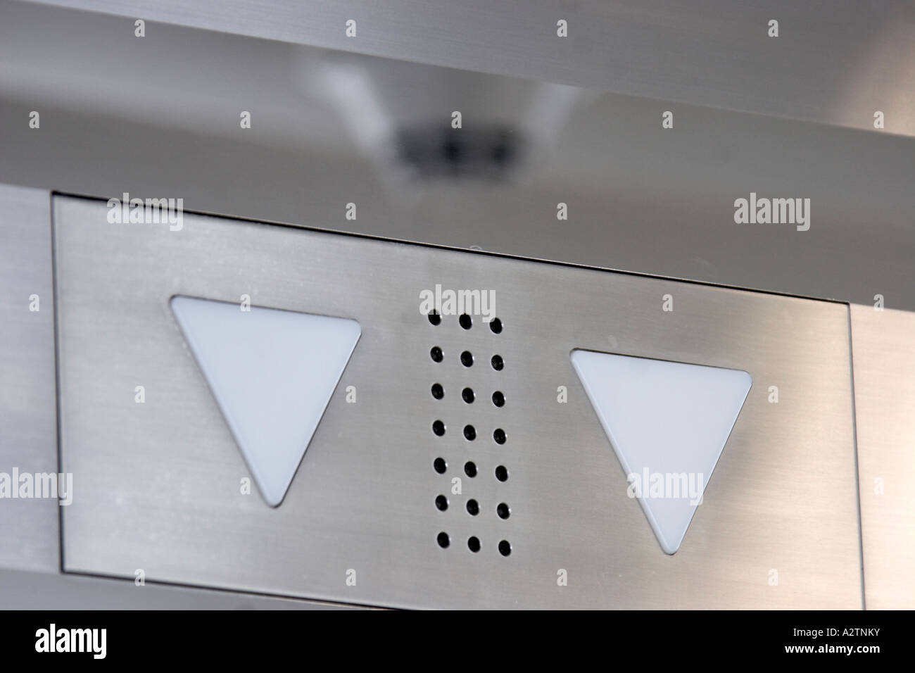 down lift arrows in office building Stock Photo - Alamy