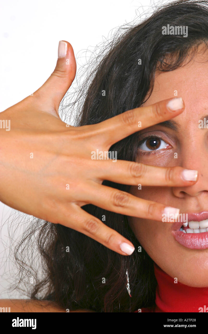 Close up of Spanish girl with spread fingers in front of her face Stock ...