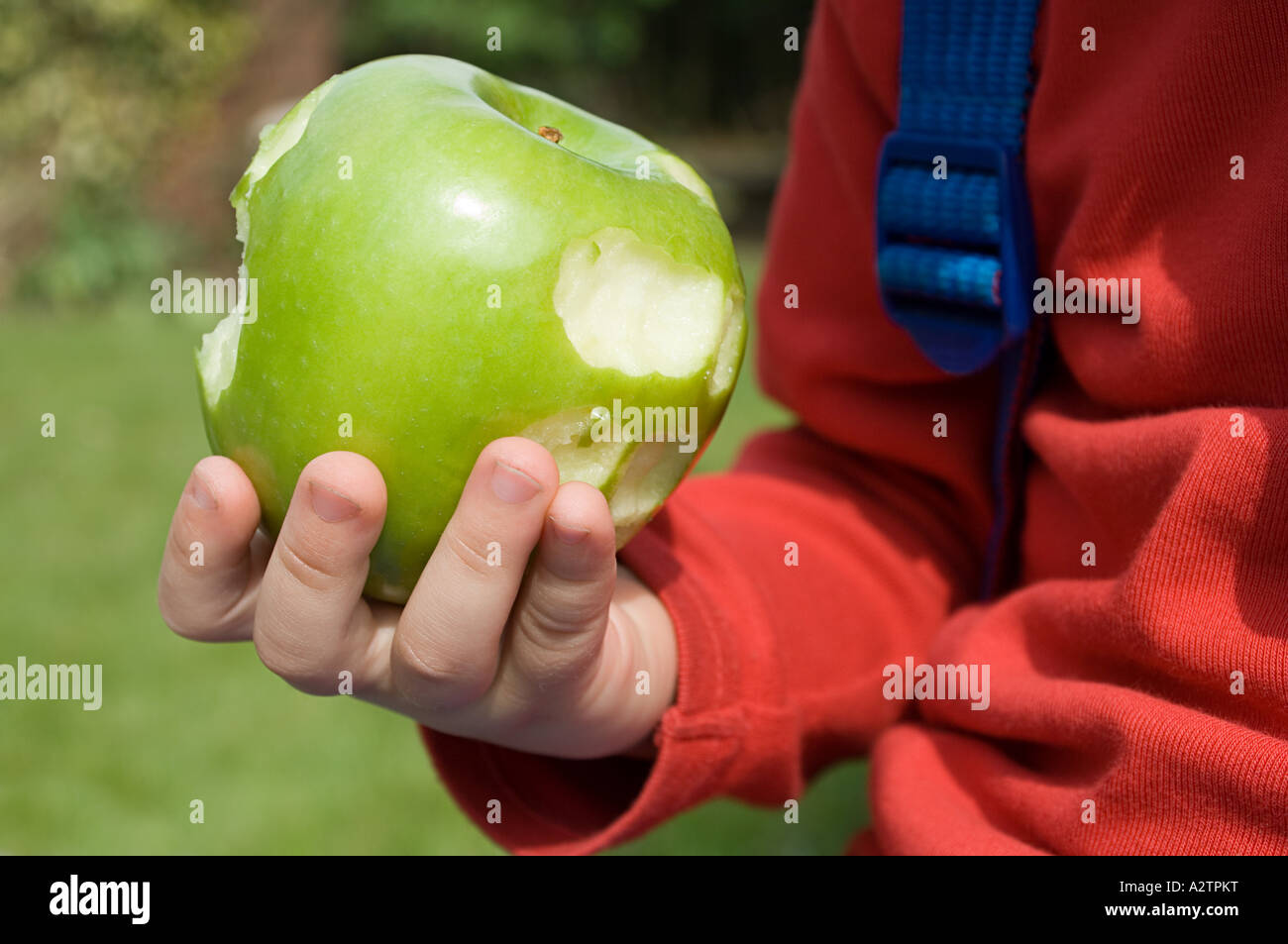 Child with an apple Stock Photo - Alamy