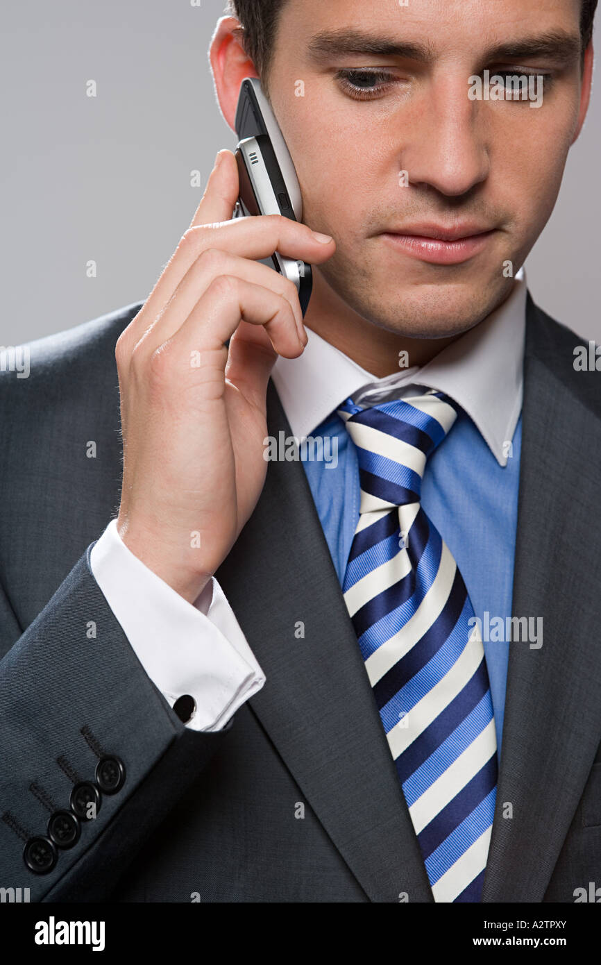 Businessman using cell phone Stock Photo - Alamy