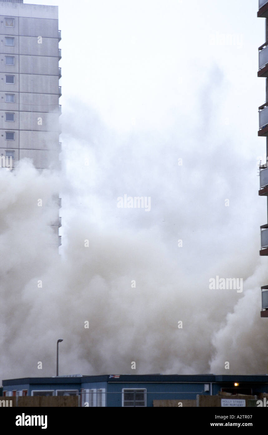 Tower block demolition using controlled explosives with tower ...