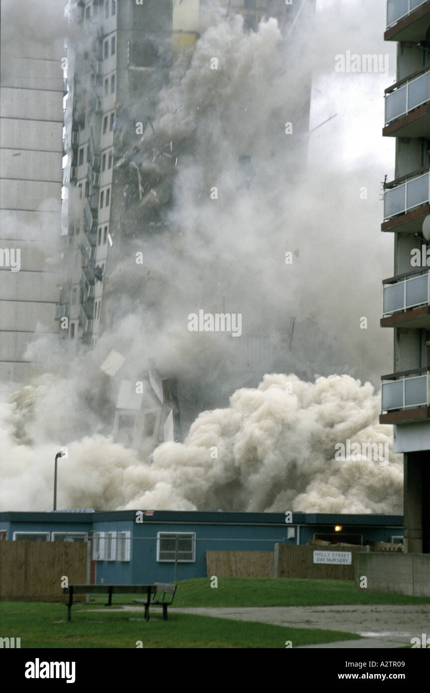 Tower block demolition using controlled explosives with tower ...