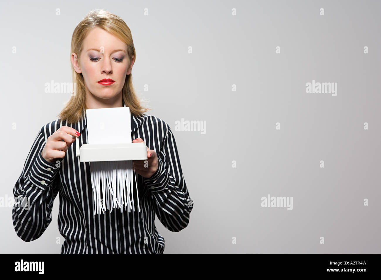 Woman shredding paper hi-res stock photography and images - Alamy