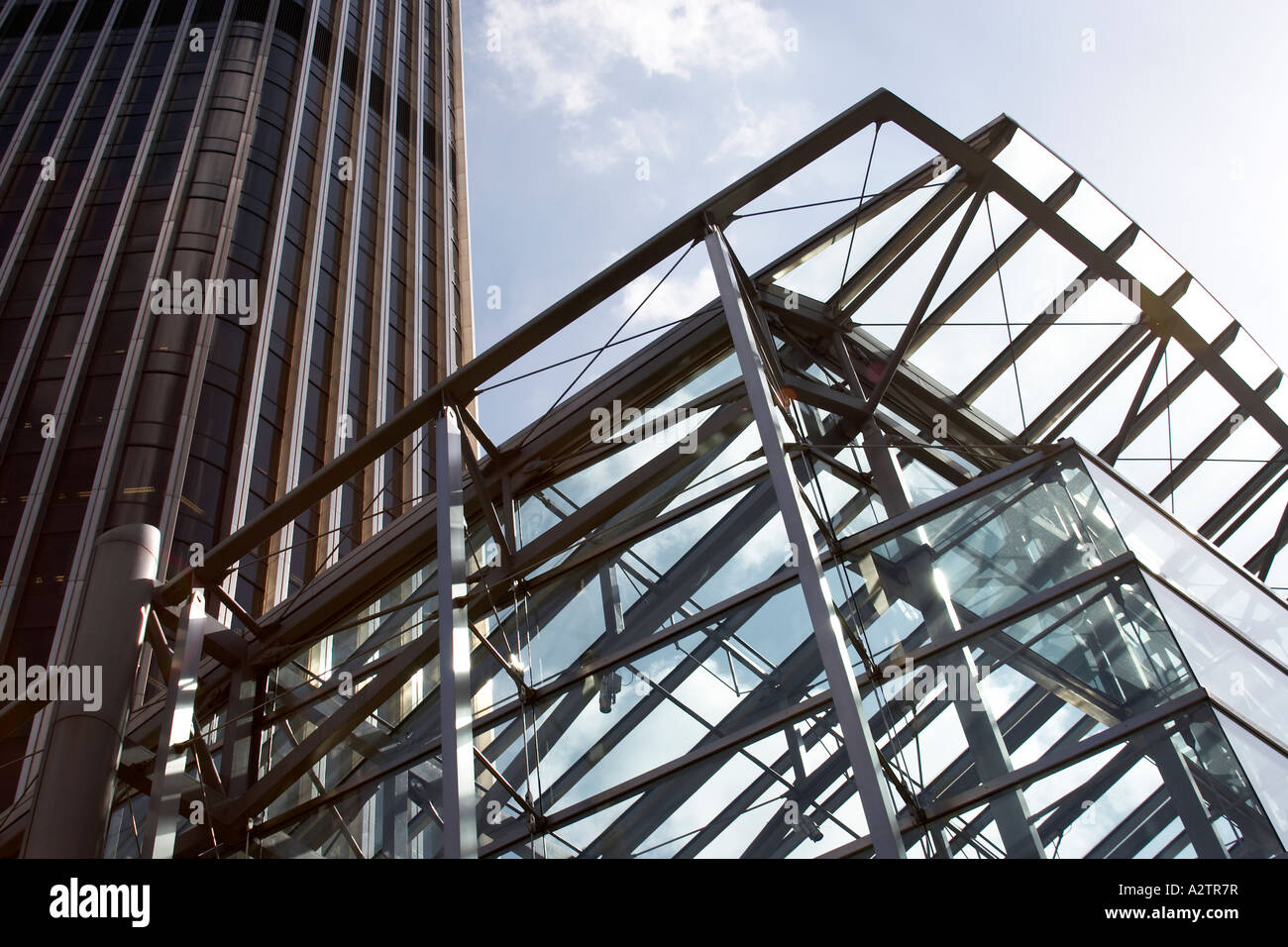 Tower 42 tall skyscraper commercial office building against blue sky ...
