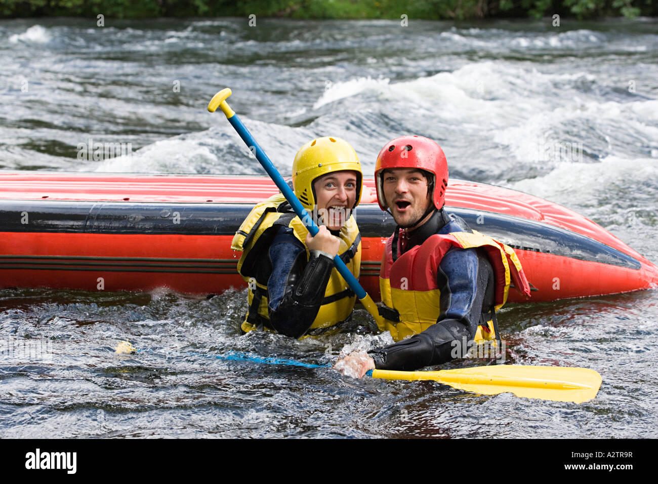 Two people white water rafting Stock Photo - Alamy