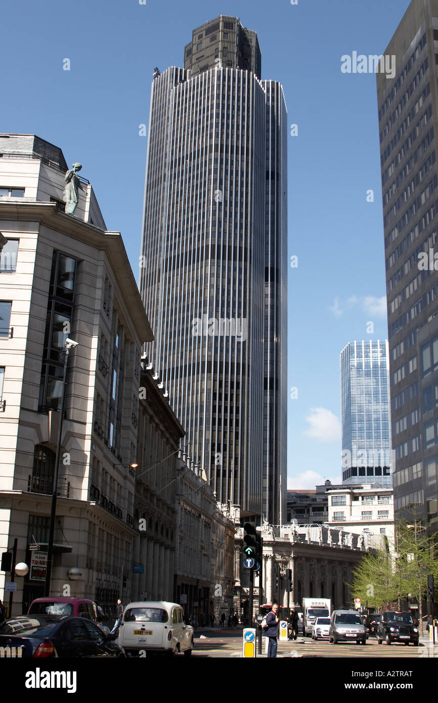 Tower 42 tall skyscraper commercial office building against blue sky ...