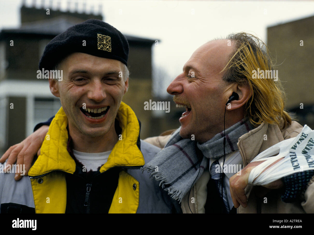 portrait of two men laughing, london Stock Photo - Alamy