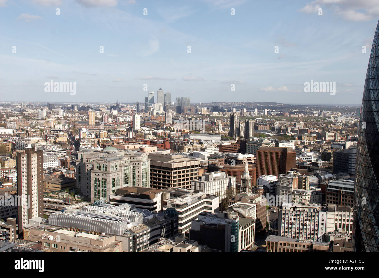 High level semi aerial view east of Canary Wharf and office buildings ...