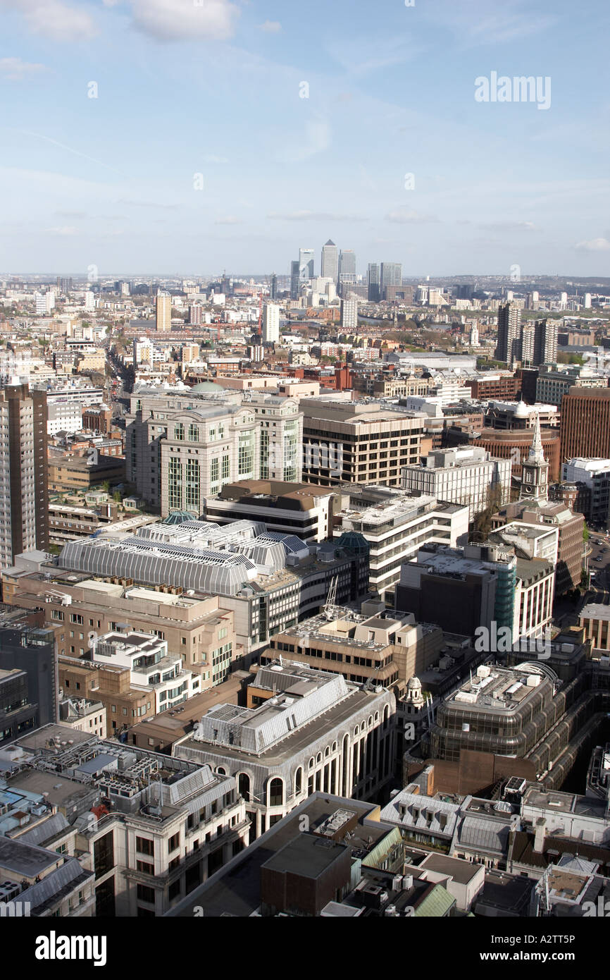 High level semi aerial view east of Canary Wharf and office buildings ...
