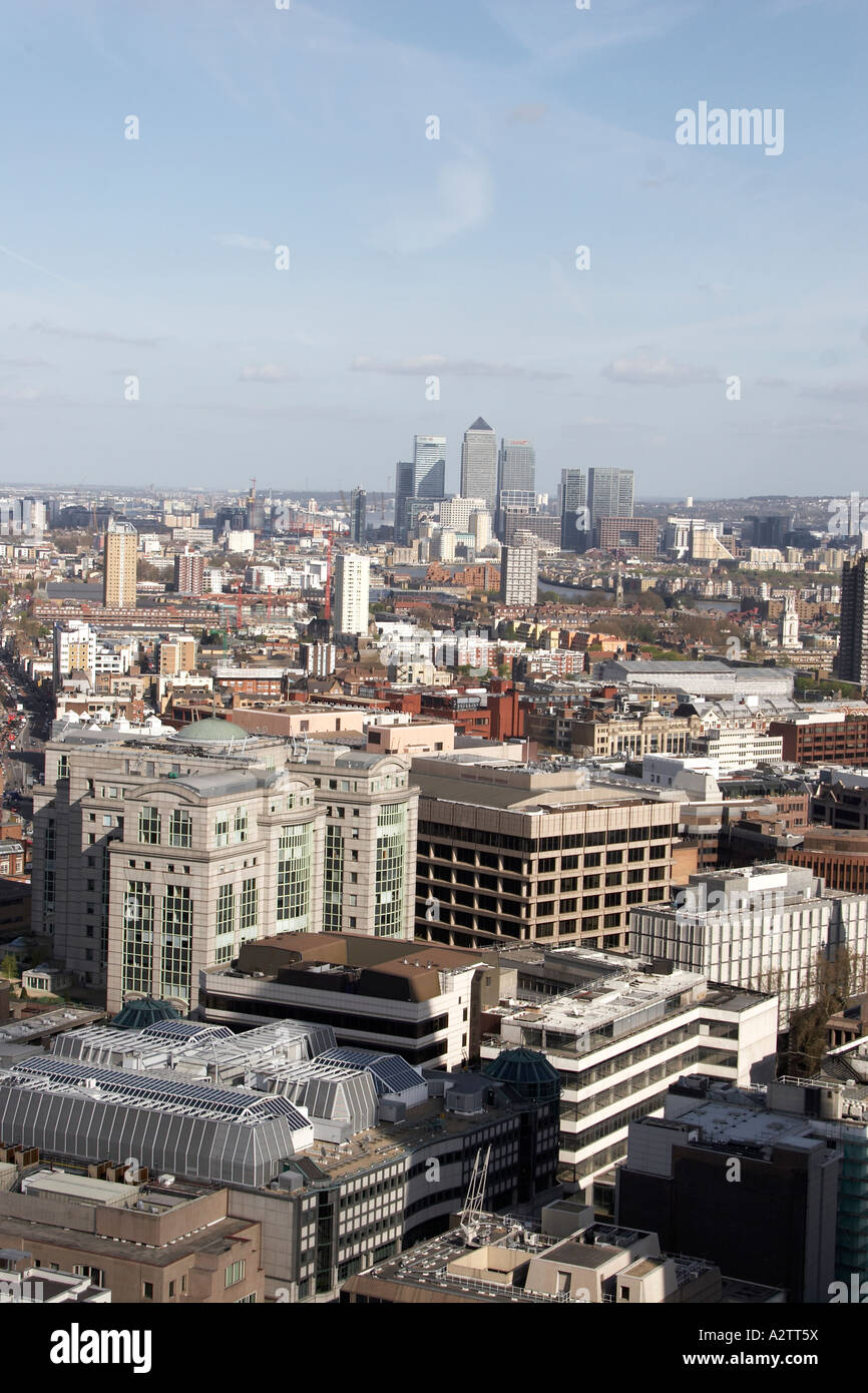 High level semi aerial view east of Canary Wharf and office buildings ...