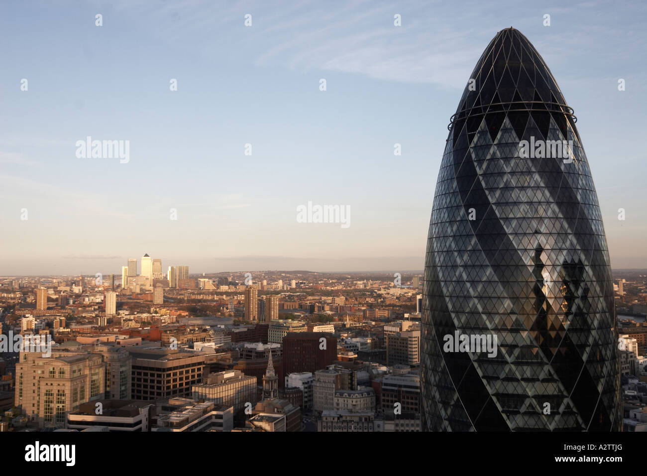 High semi aerial view east to Canary Wharf of Gherkin and office ...