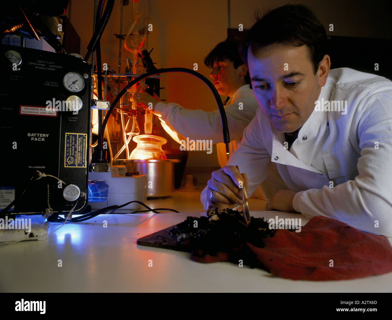 Police investigating with technology hi-res stock photography and ...