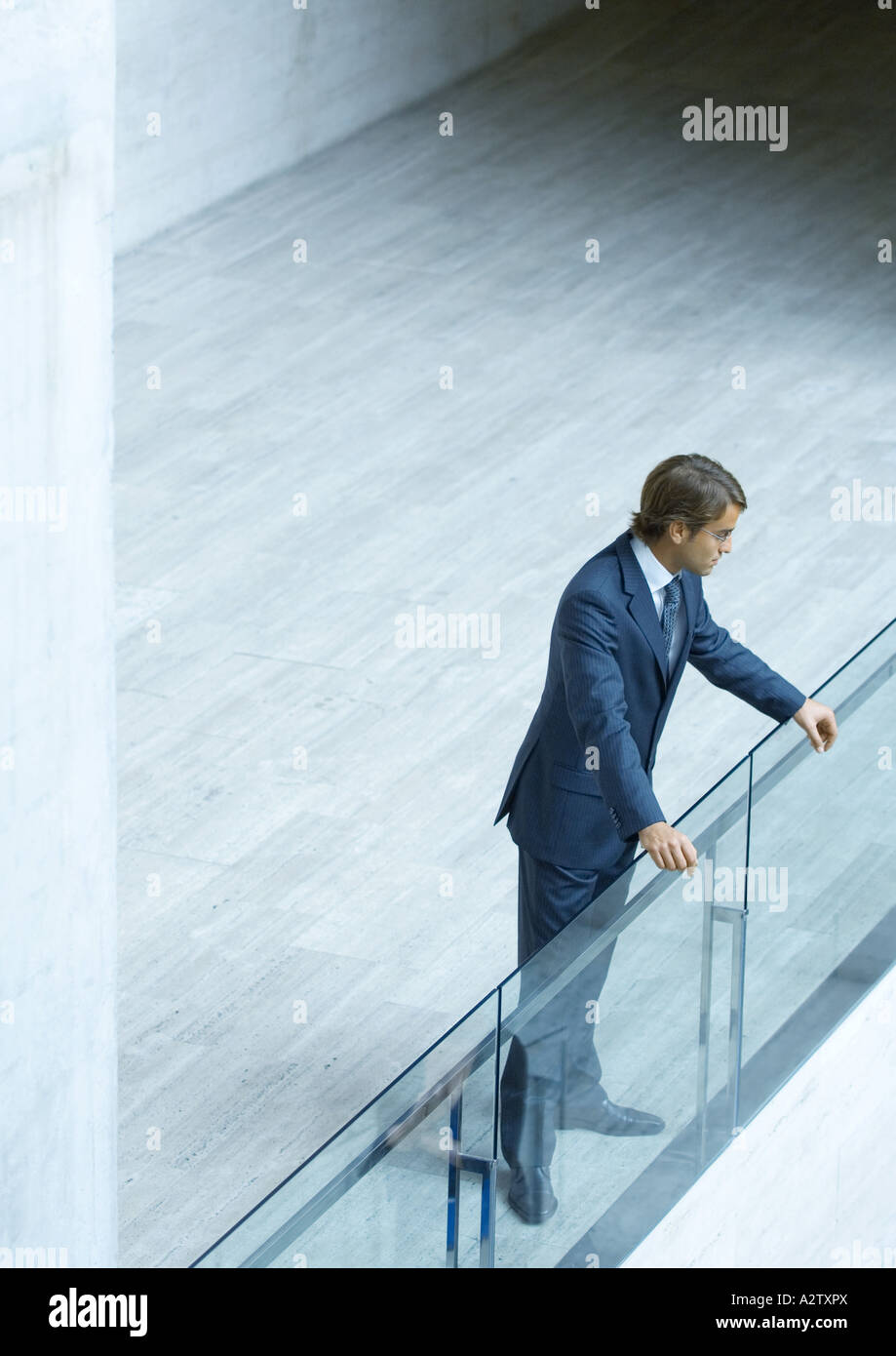 Man looking over railings hi-res stock photography and images - Alamy