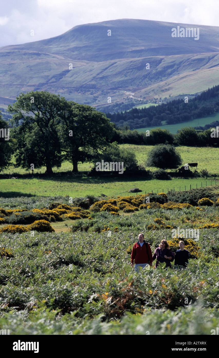 Family walking on the common near the National Park Visitor Centre at ...