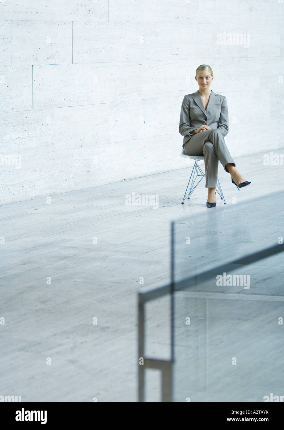 Businesswoman sitting, portrait Stock Photo - Alamy