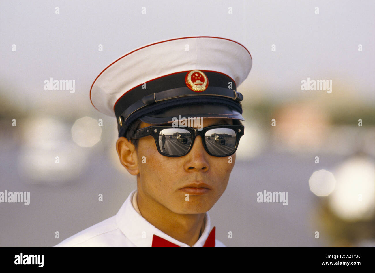 chinese policeman wearing mirrored sunglasses Stock Photo - Alamy