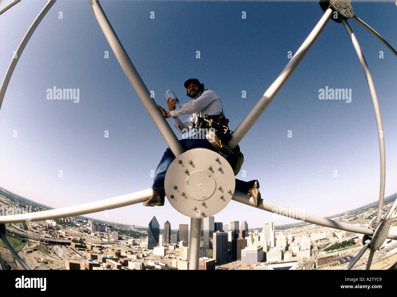 electrician dallas usa climbing on scaffolding high up view looking ...