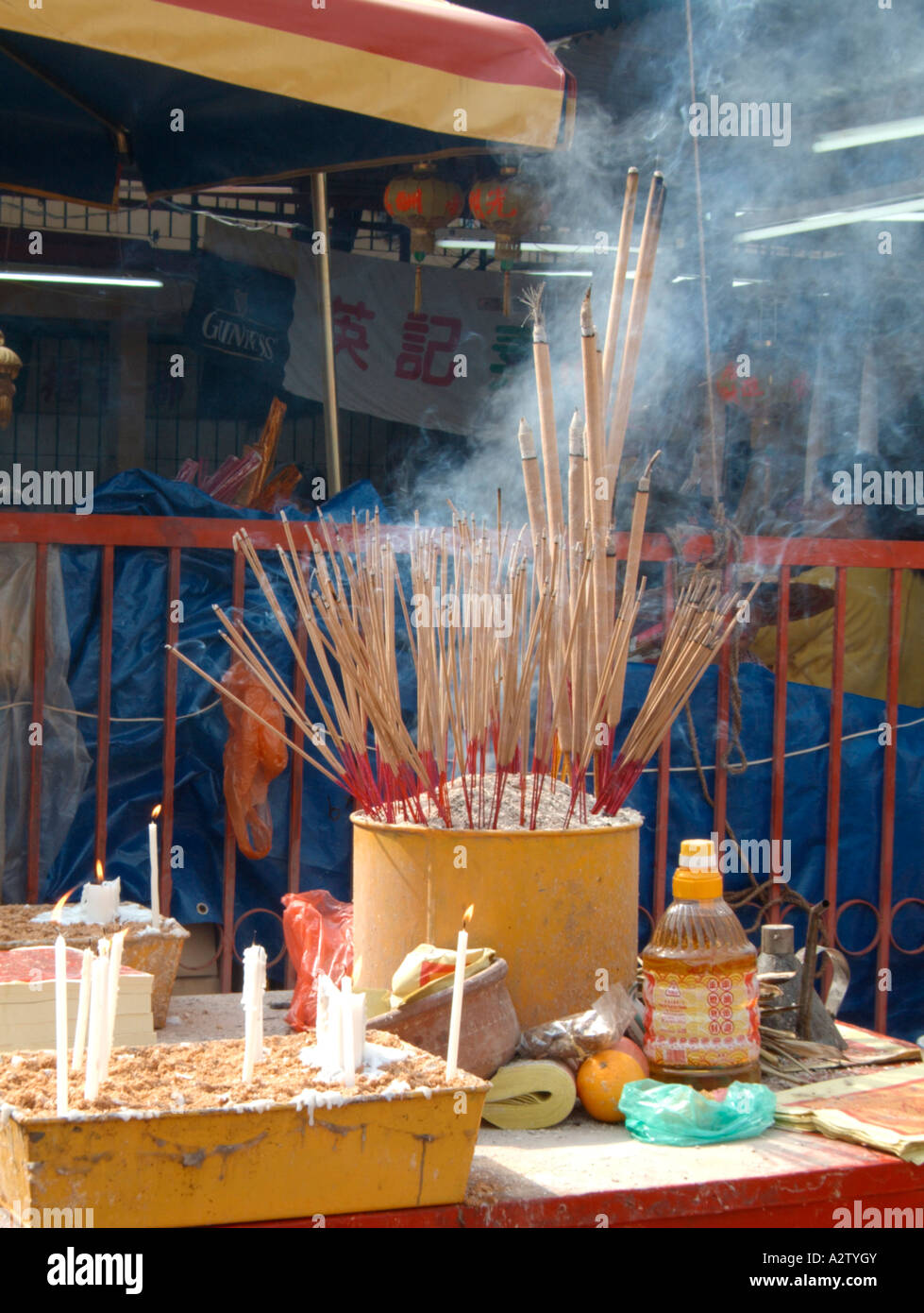 burning incense at chinese temple Stock Photo - Alamy