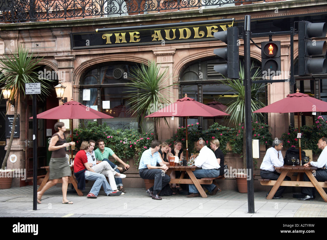 People drinking and talking outside The Audley pub in Mayfair London W1 ...