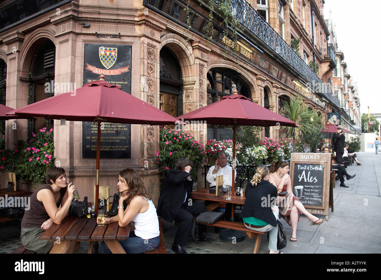 People drinking and talking outside The Audley pub in Mayfair London W1 ...