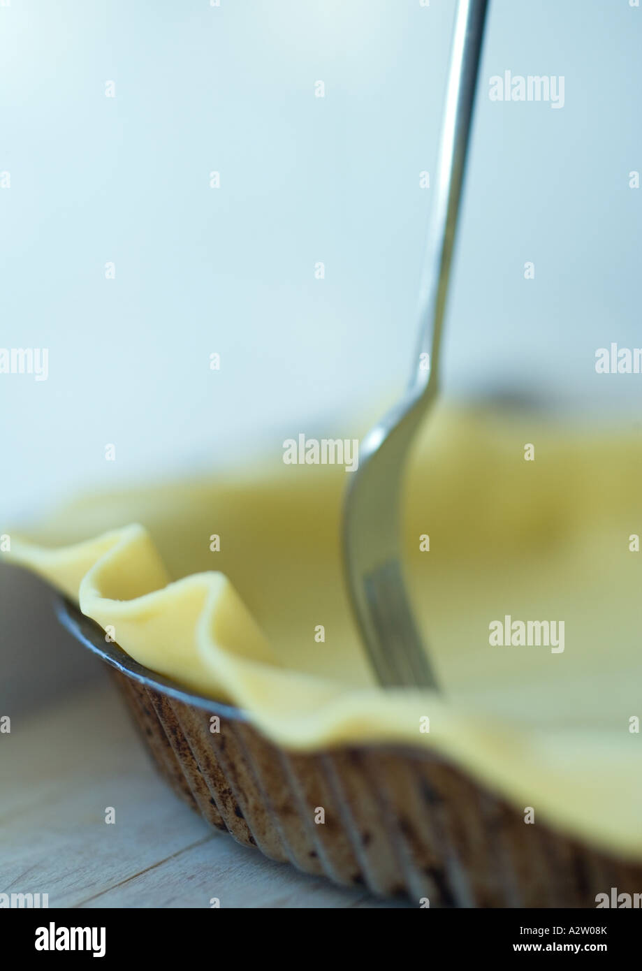 Fork and pie crust dough Stock Photo - Alamy