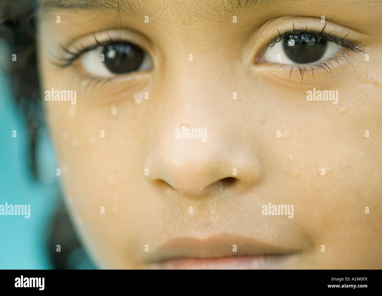 Girl's wet face, extreme close-up Stock Photo - Alamy