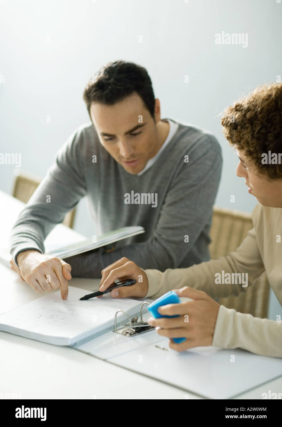 Father son teenage looking eyes hi-res stock photography and images - Alamy