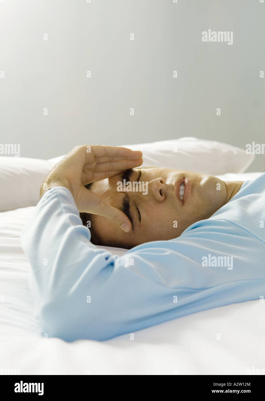 Hand on foreheads hi-res stock photography and images - Alamy