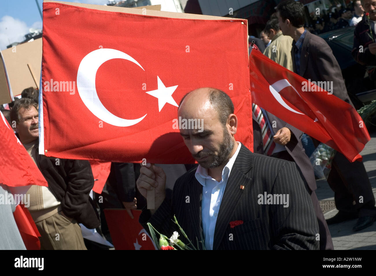 Turkish man demonstrating with a national flag during the celebrations ...