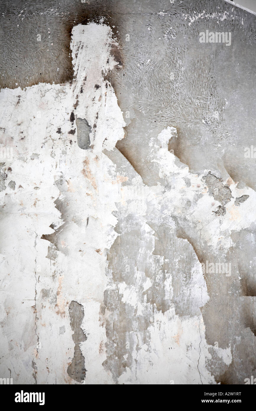 Abstract patterns of burnt paint on a concrete wall in London Stock ...
