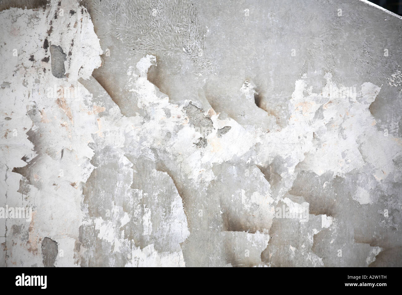 Abstract patterns of burnt paint on a concrete wall in London Stock ...
