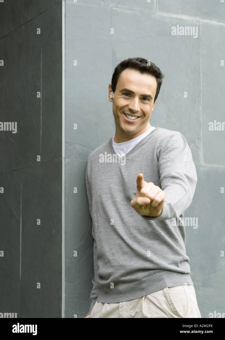 Man, pointing at camera, portrait Stock Photo - Alamy