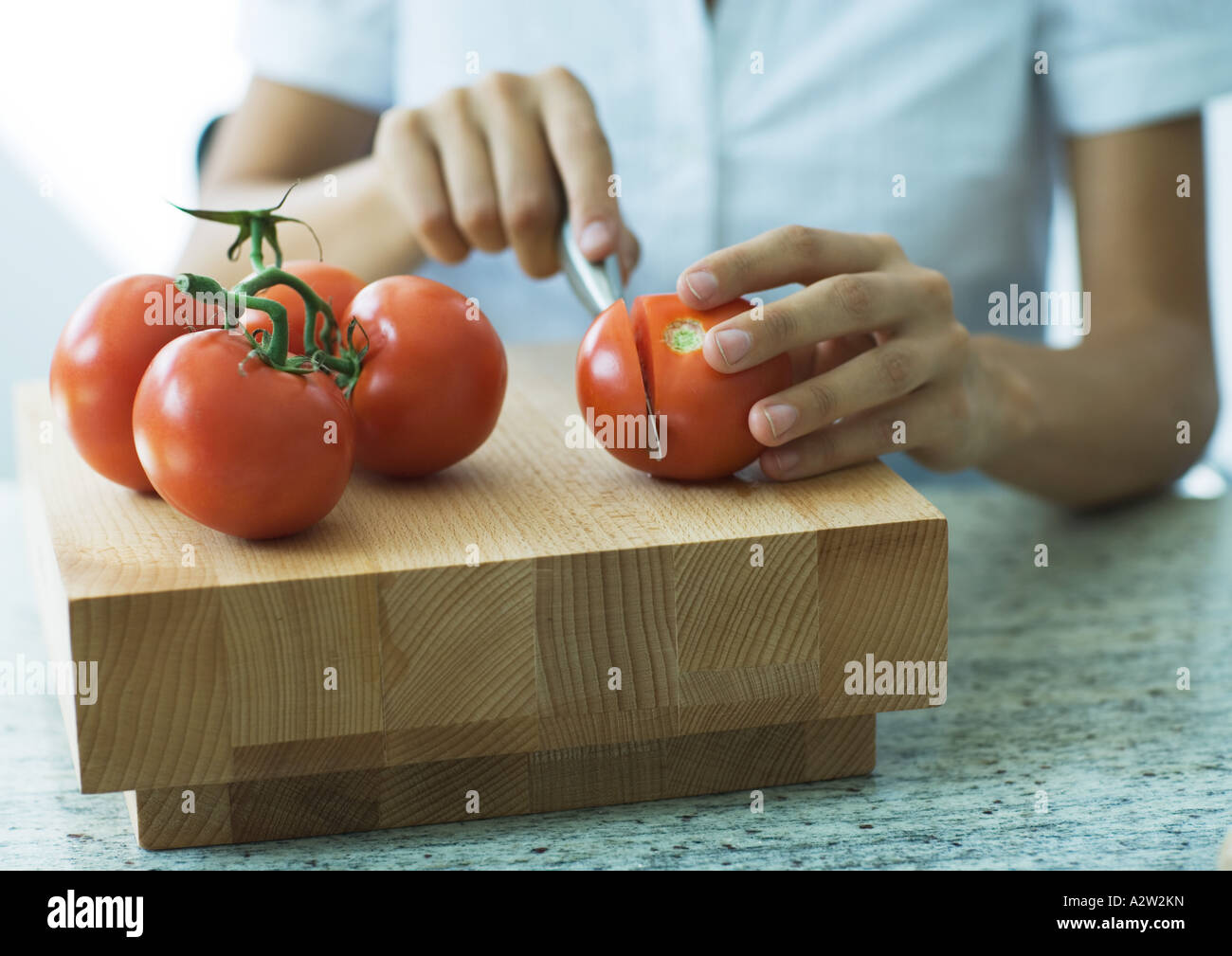 Woman tomato vine kitchen hi-res stock photography and images - Alamy