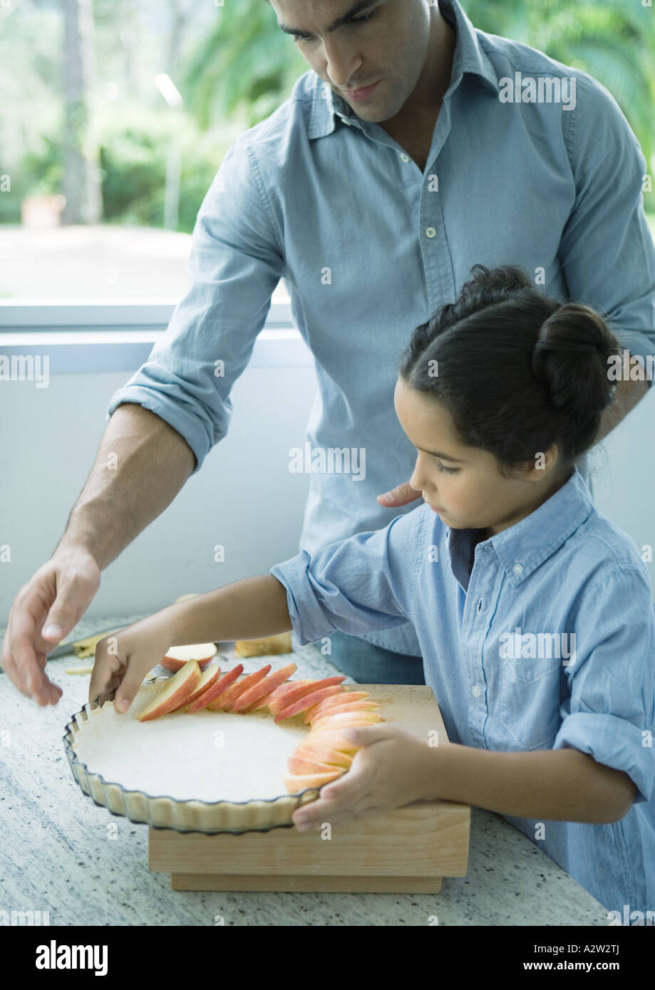 Father and daughter cooking together Stock Photo - Alamy